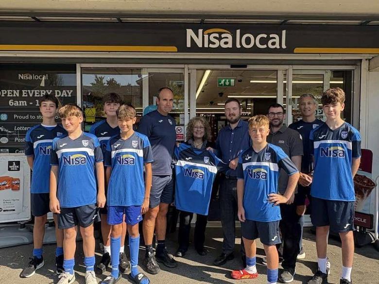 its supporting its community with a donation of £735 to Merley Sports ...